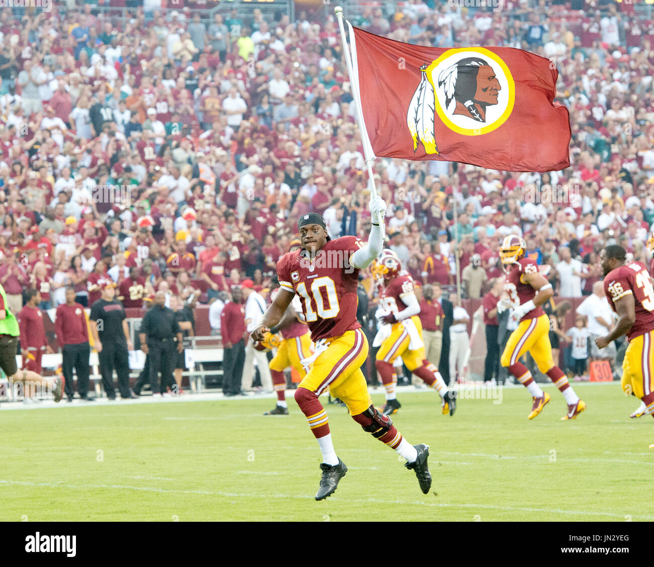 Washington Redskins quarterback Robert Griffin III (10) carries the ...