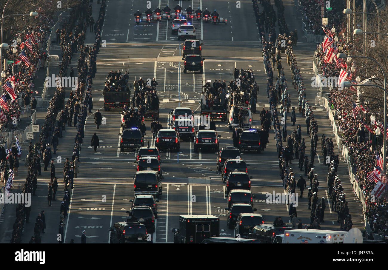 The presidential motorcade takes part in the Inaugural parade on its ...