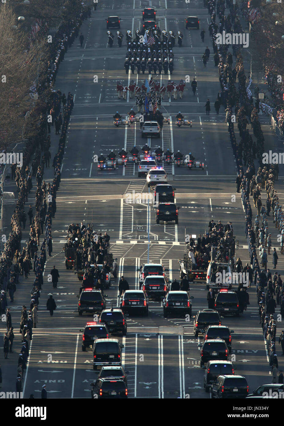 The presidential motorcade takes part in the Inaugural parade on its ...