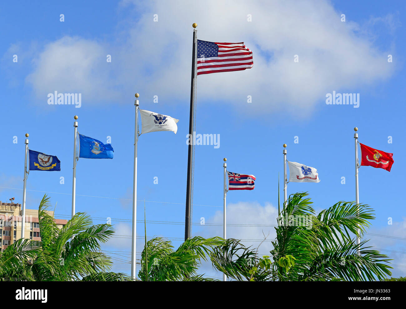 Flags flying over the Naval Visitor's Center in Pearl Harbor, Hawaii on ...