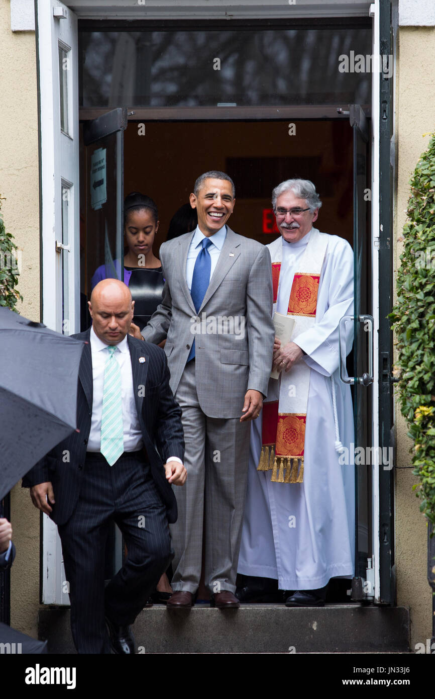 Reverend Dr. Luis Leon, right, looks on as United States President ...