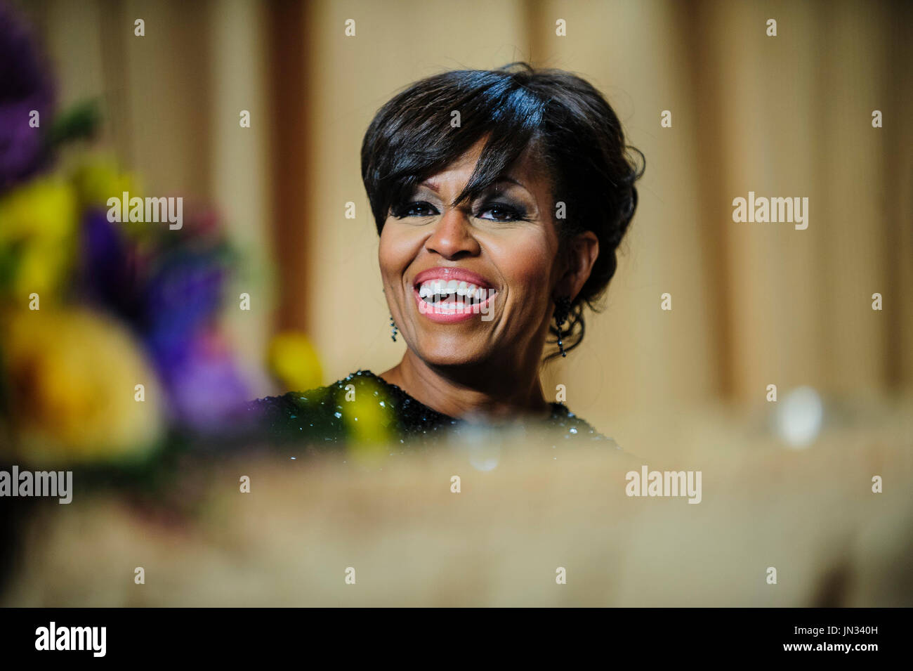 First Lady Michelle Obama reacts to a joke told by comedian Conan O ...