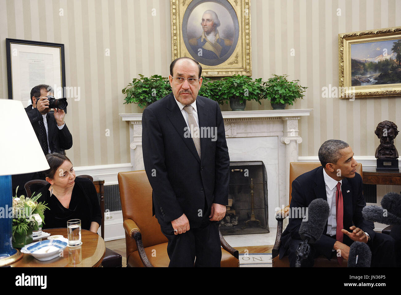 Prime Minister Nouri Al-Maliki of Iraq, left, looks on after a meeting ...
