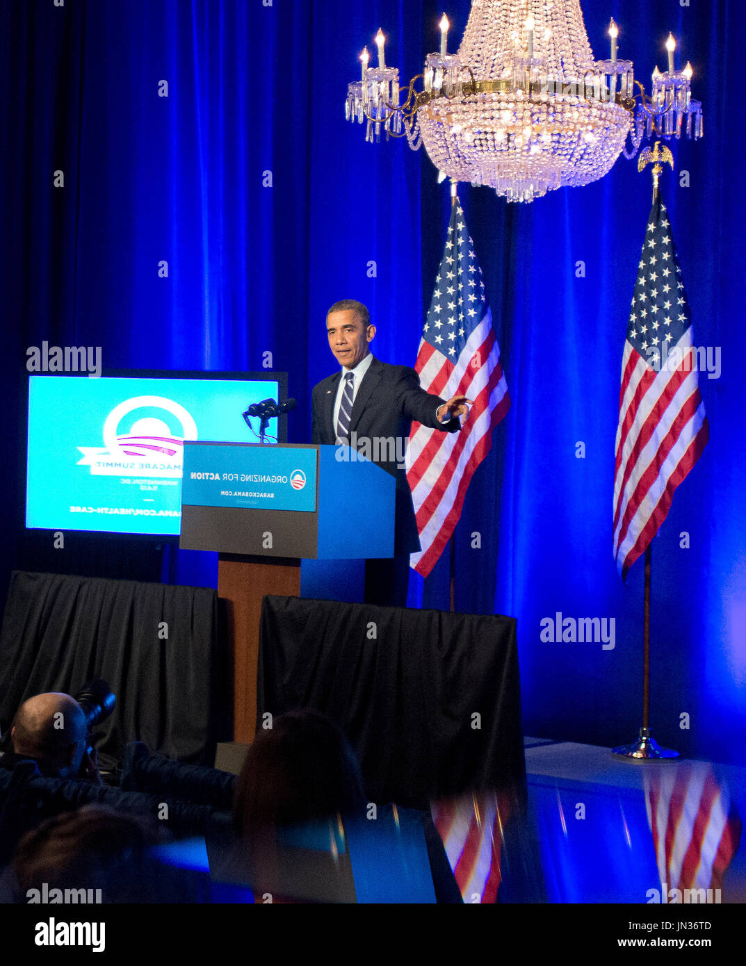 United States President Barack Obama is photographed in a mirror as he ...