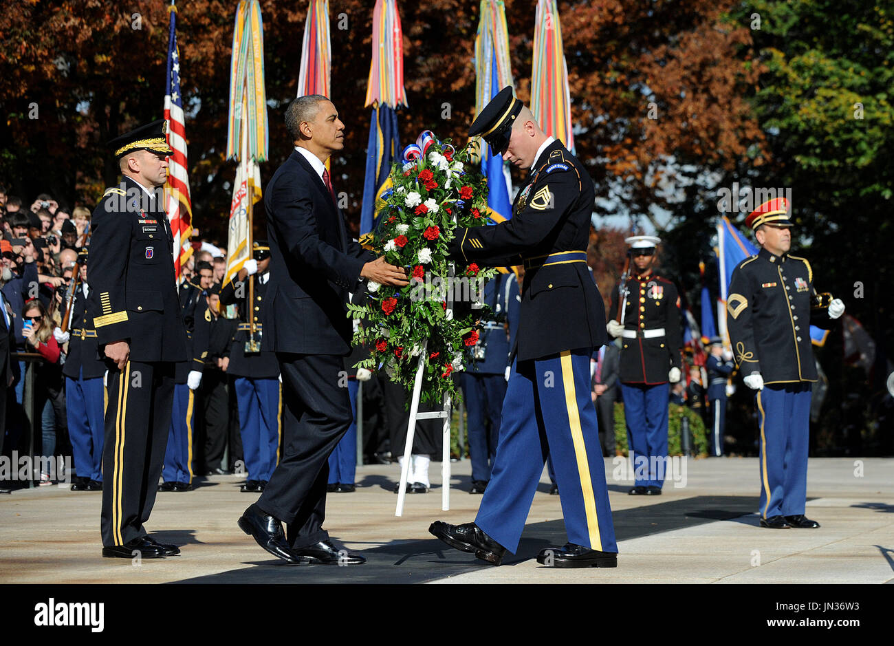 United States President Barack Obama positions a commemorative wreath ...