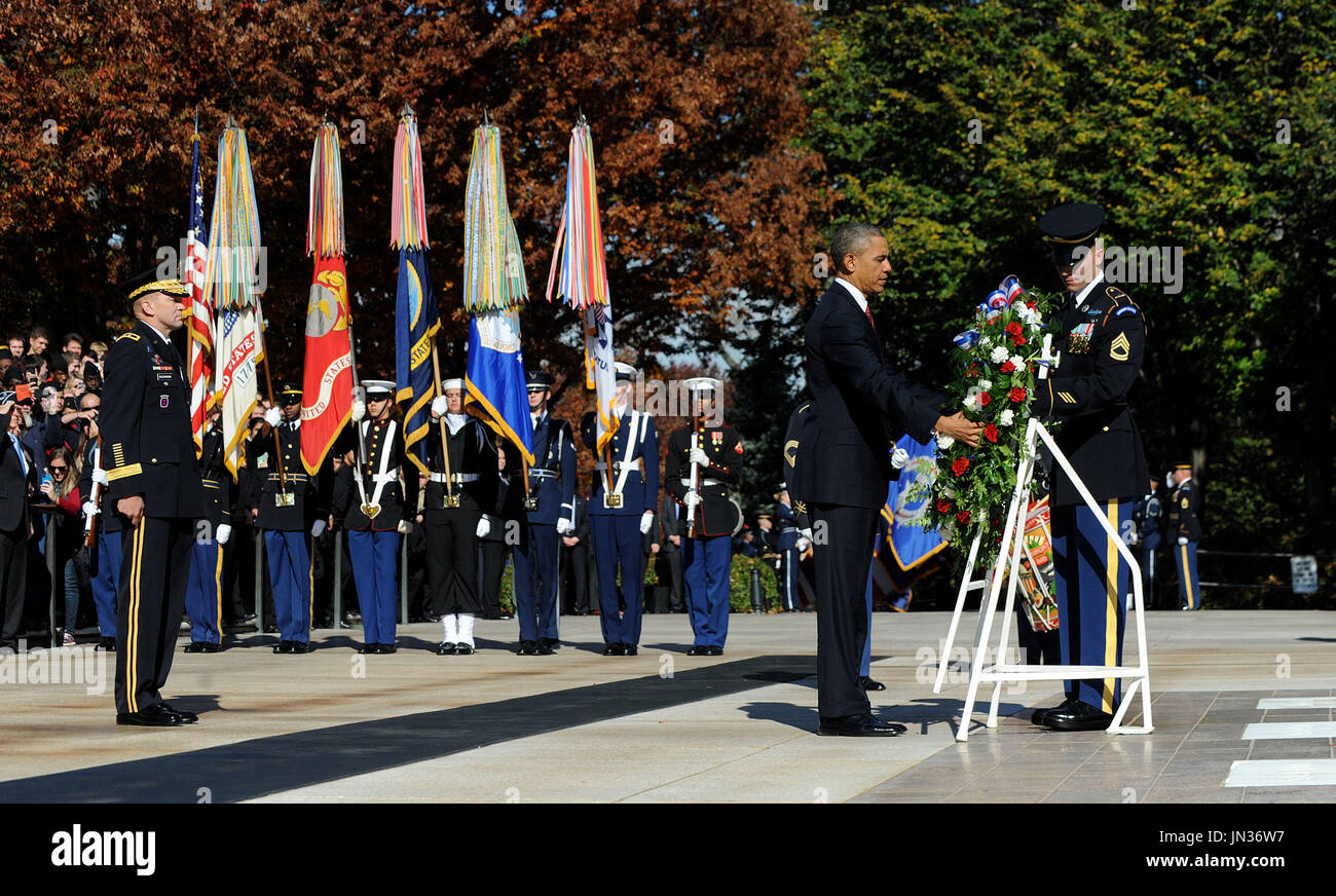 United States President Barack Obama positions a commemorative wreath ...