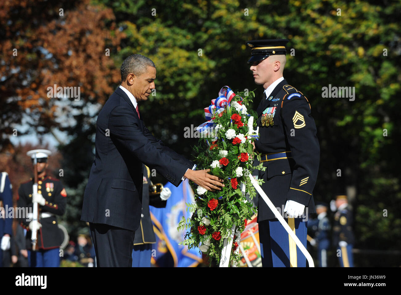 United States President Barack Obama positions a commemorative wreath ...