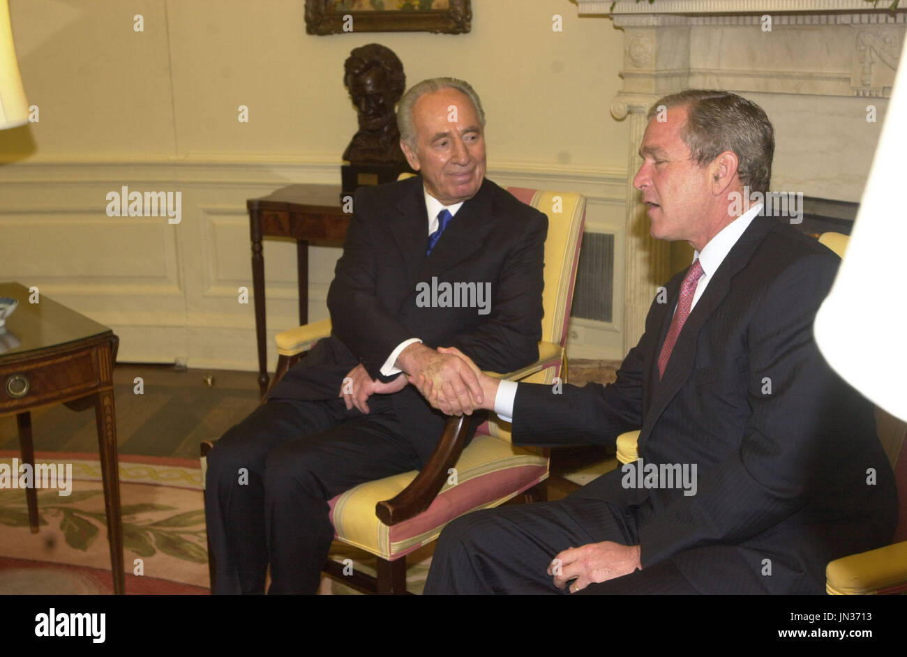 United States President George W. Bush shakes hands with Foreign ...