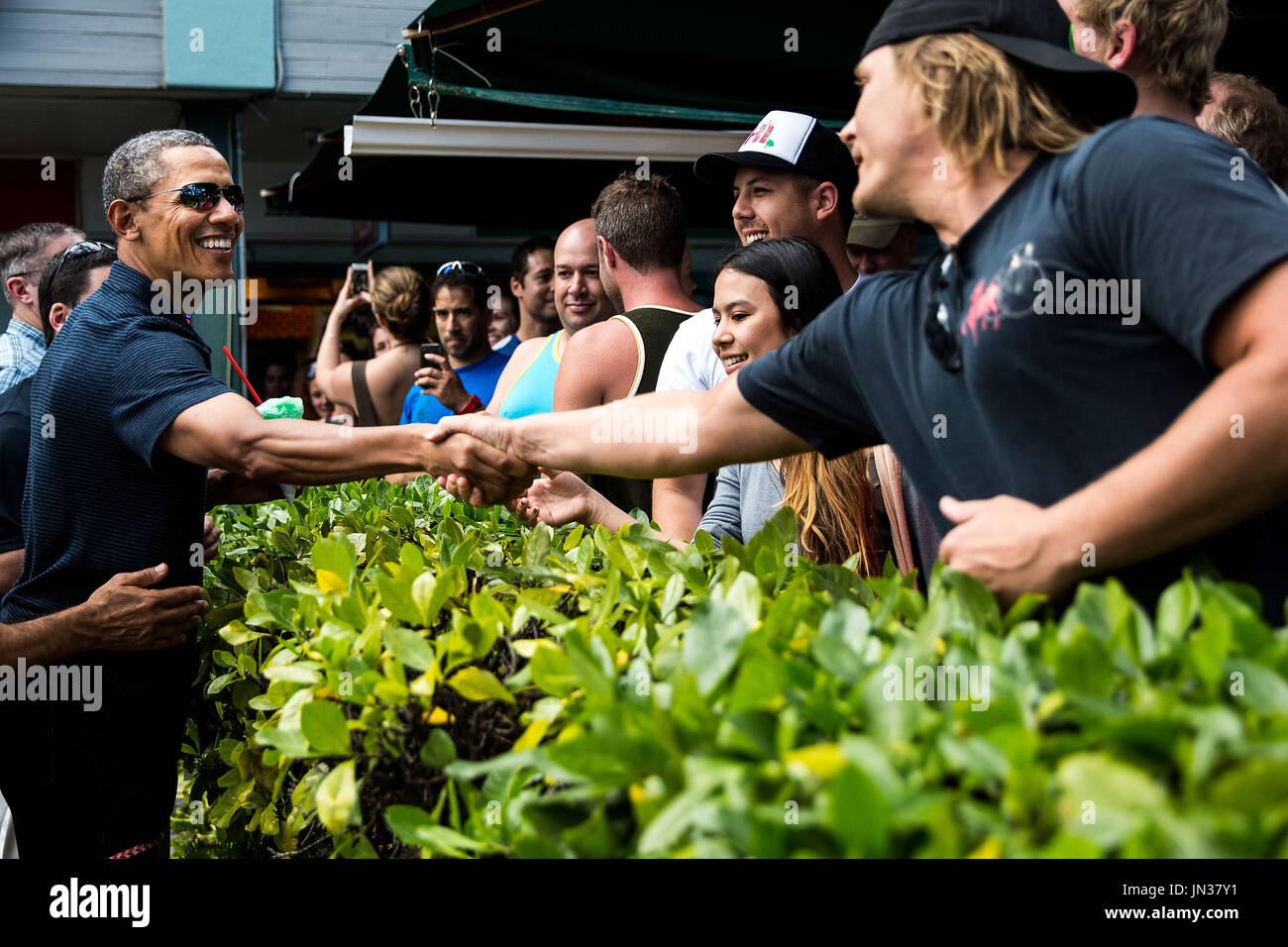United States President Barack Obama greets well-wishers outside of ...