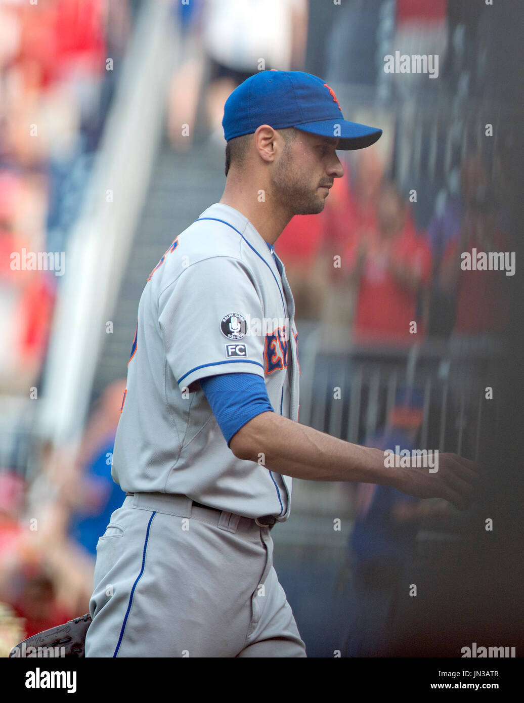 New York Mets pitcher Carlos Torres (52) walks quickly to the clubhouse ...
