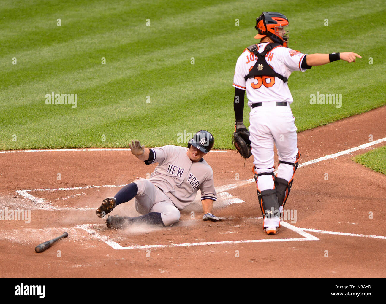 New York Yankees left fielder Brett Gardner (11) scores the first run ...