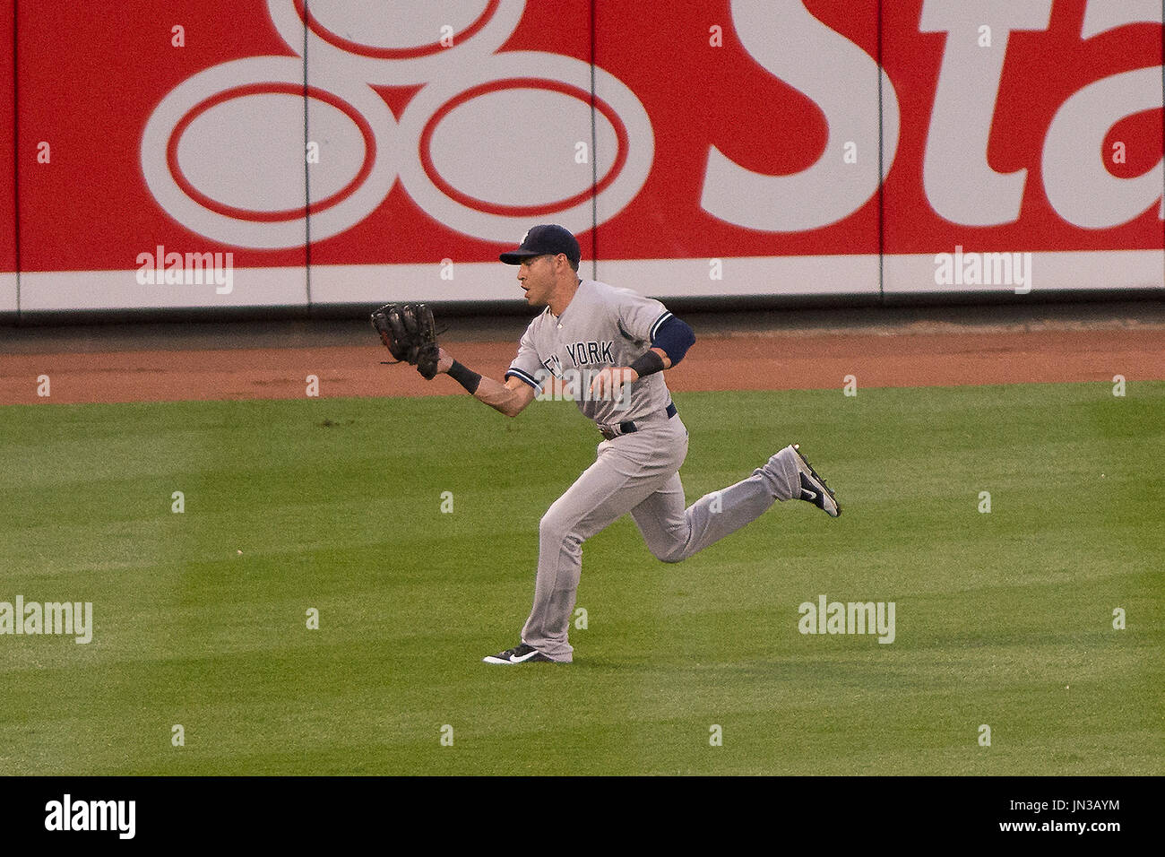 New York Yankees center fielder Jacoby Ellsbury (22) catches a fly ball ...