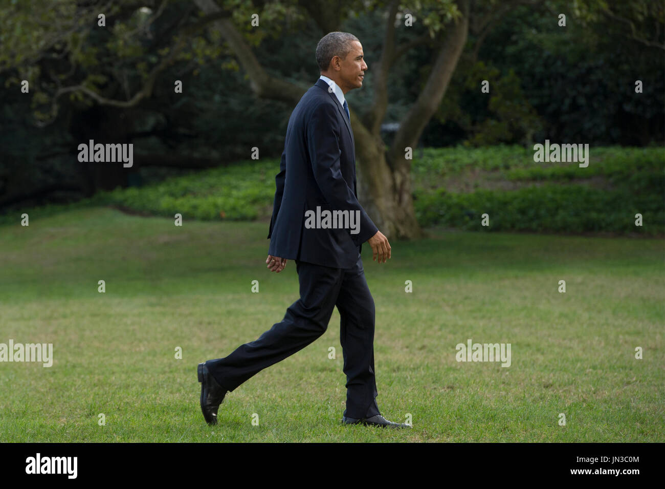 US President Barack Obama arrives on the South Lawn of the White House ...
