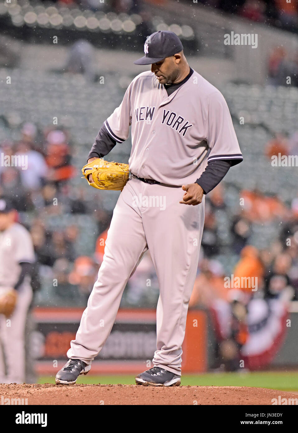 New York Yankees starting pitcher CC Sabathia (52) toes the mound after ...
