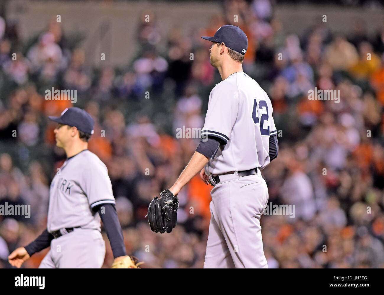 New York Yankees relief pitcher Chris Martin (57) looks to the outfield ...