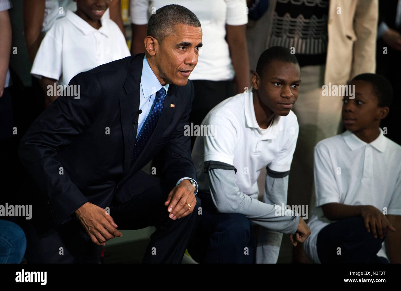 US President Barack Obama poses for a picture with students after ...