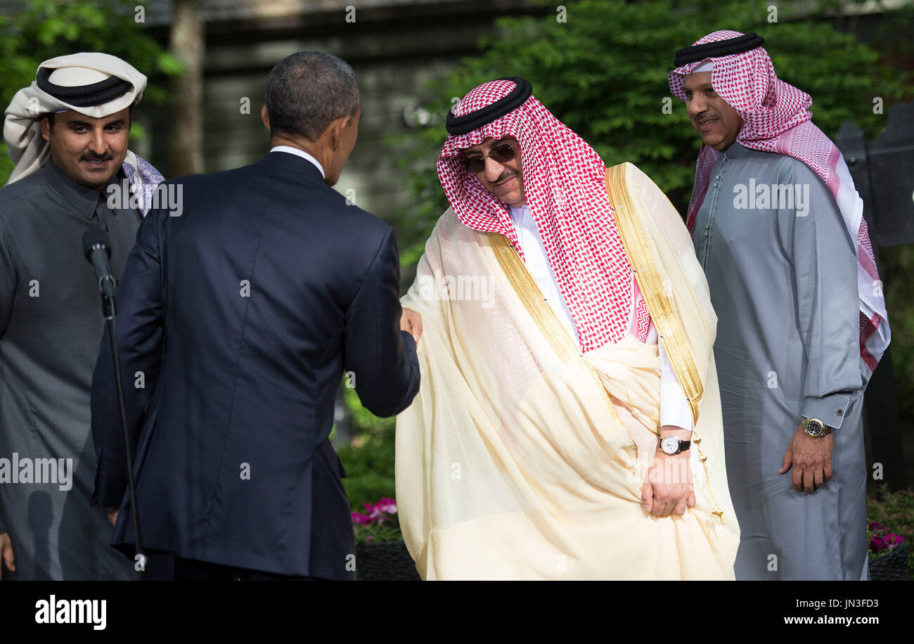 United States President Barack Obama shakes hands with Saudi Arabia ...