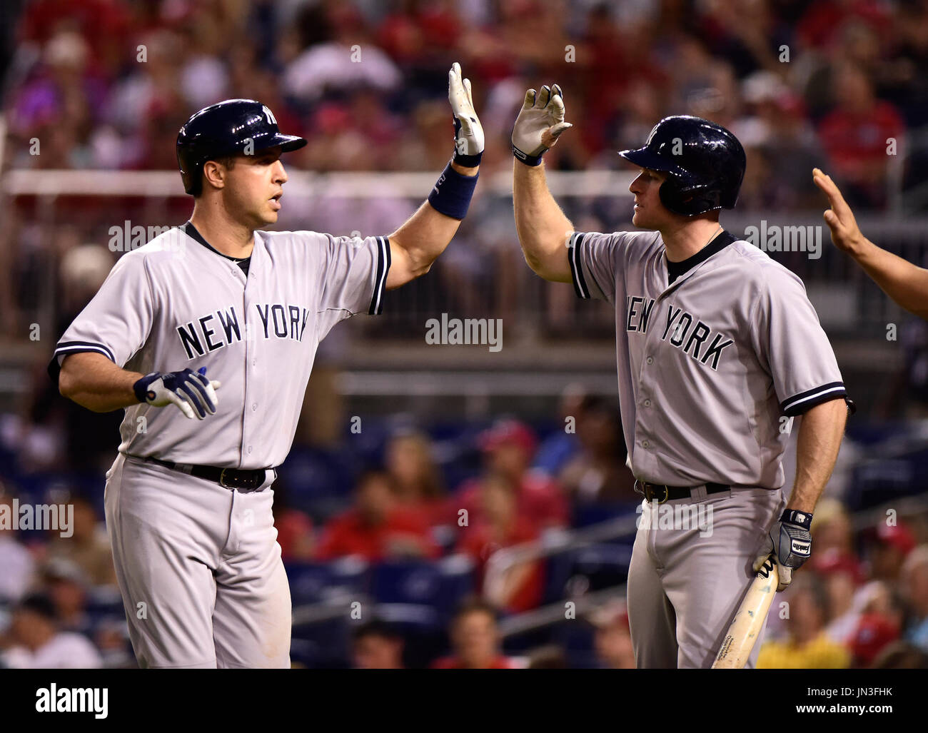 New York Yankees first baseman Mark Teixeira (25) celebrates his fifth ...