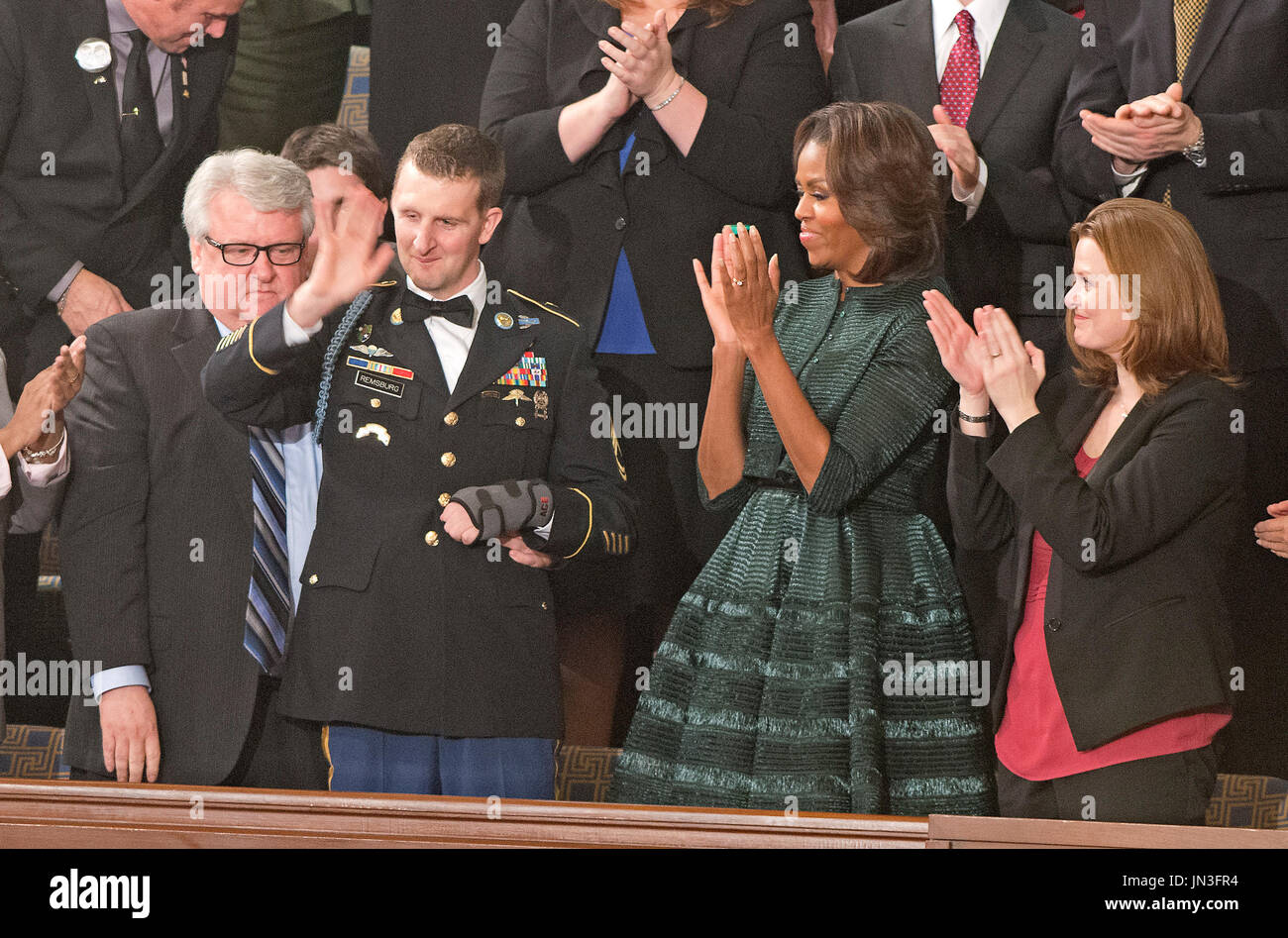 United States Army Sergeant 1st Class Cory Remsburg acknowledges the ...