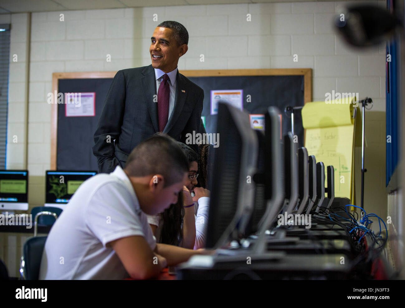 United States President Barack Obama tours a seventh grade classroom ...