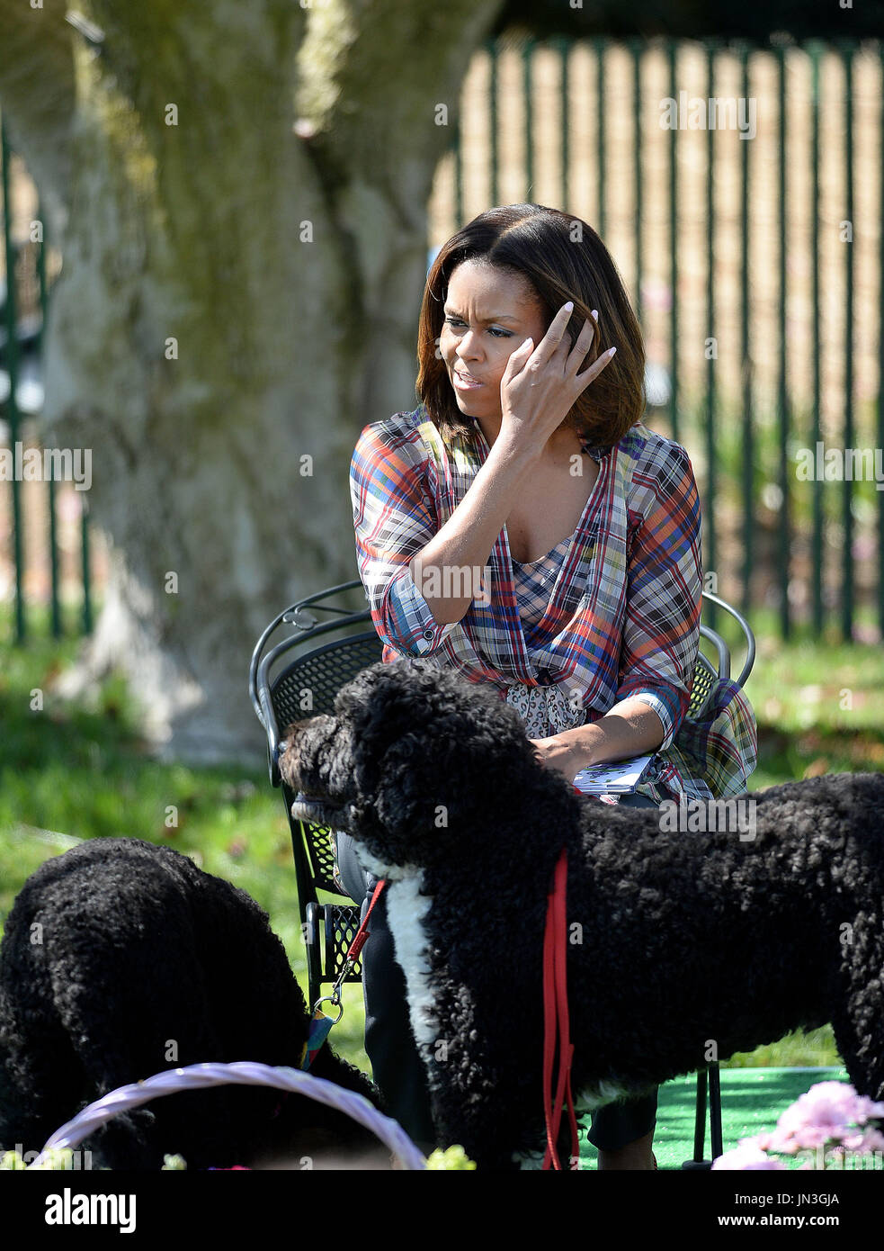 United States first lady Michelle Obama with her dogs, Bo and Sunny ...