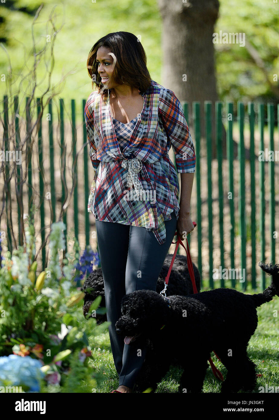 United States first lady Michelle Obama with her dogs, Bo and Sunny ...