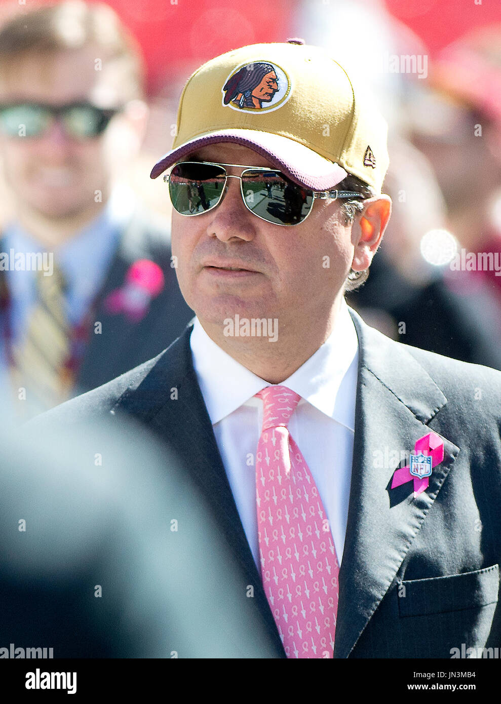 Washington Redskins owner Daniel M. Snyder wears a Redskins cap on the ...
