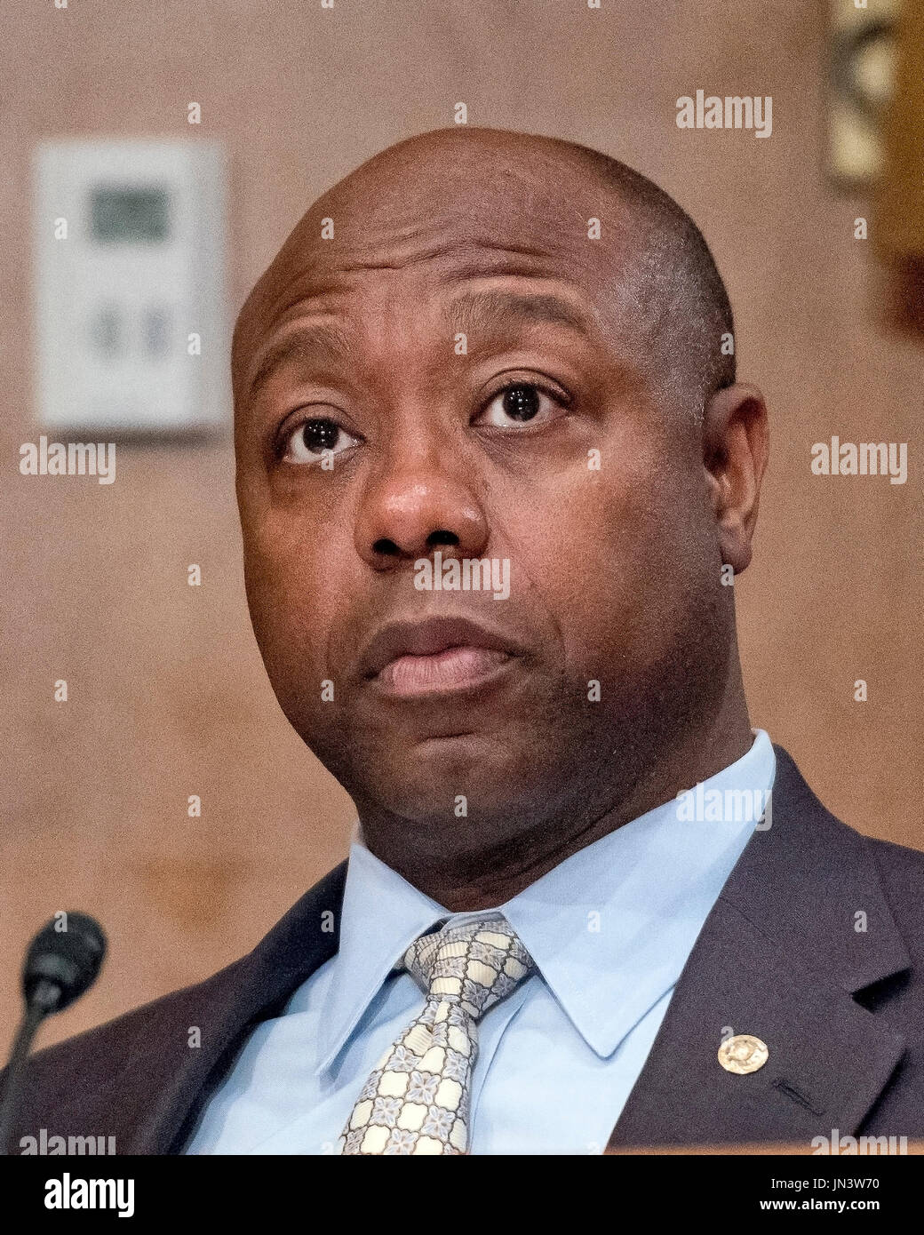 United States Senator Tim Scott (Republican of South Carolina) listens ...