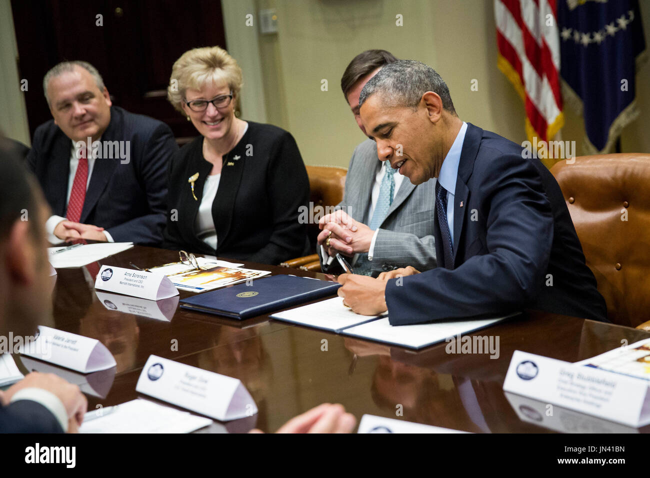 United States President Barack Obama signs a Presidential Memorandum to ...