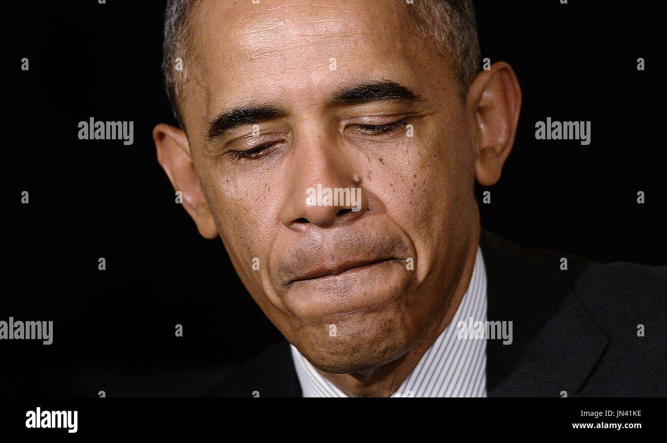 United States President Barack Obama delivers remarks and answers ...