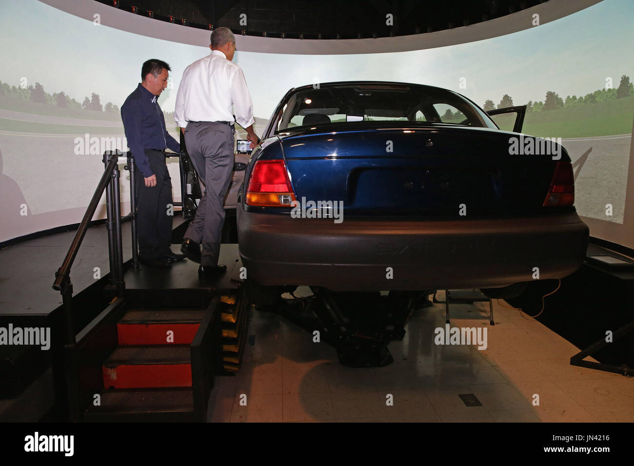 United States President Barack Obama prepares to get into a driving ...