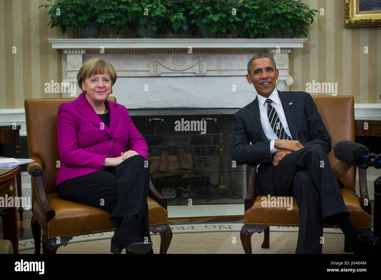 US President Barack Obama (R) and German Chancellor Angela Merkel (L ...