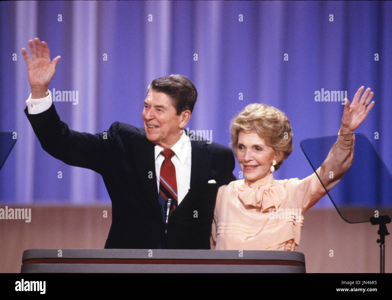 United States President Ronald Reagan and first lady Nancy Reagan wave ...