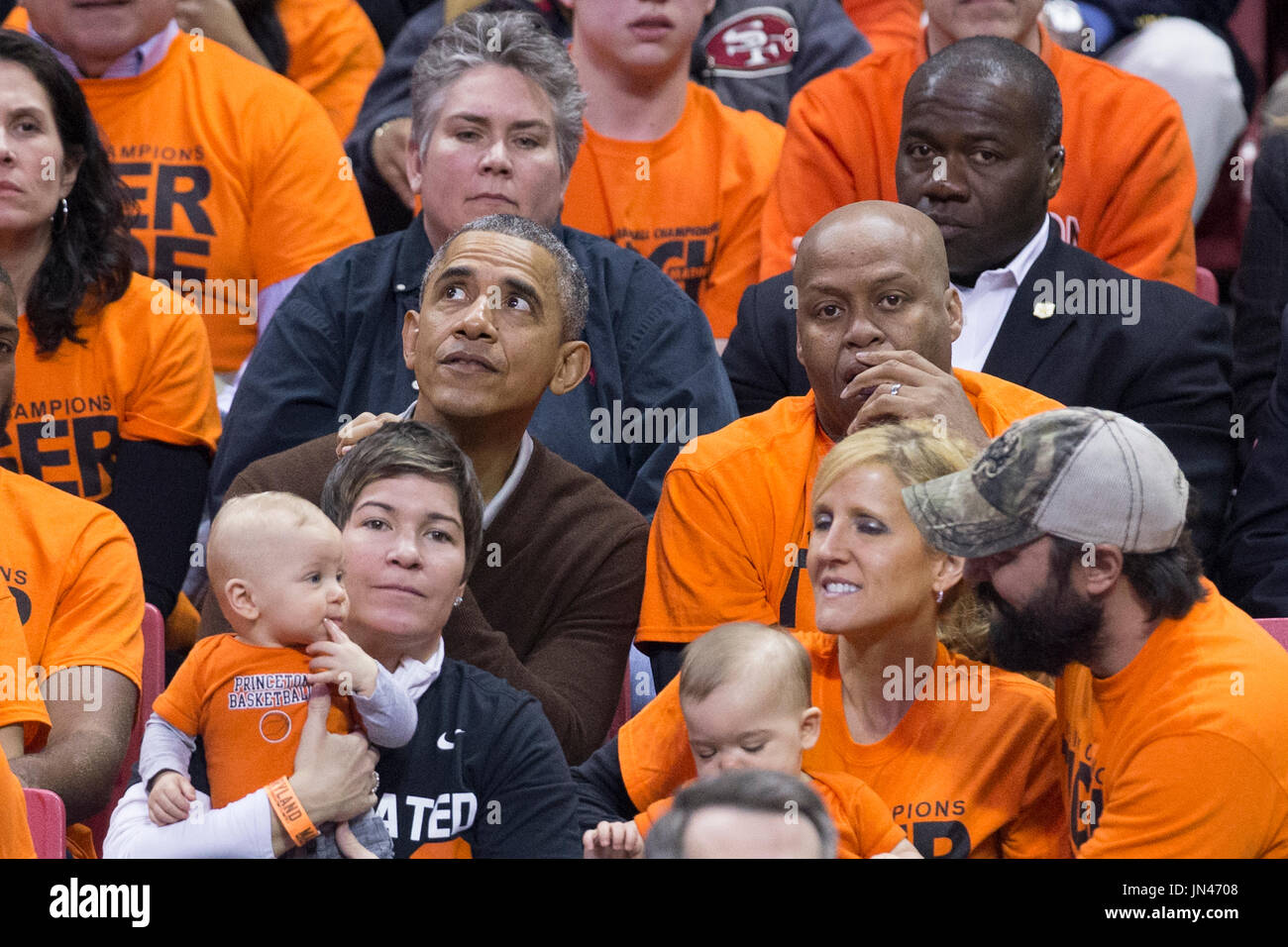 US President Barack Obama (L-C) sits beside his brother-in-law Craig ...