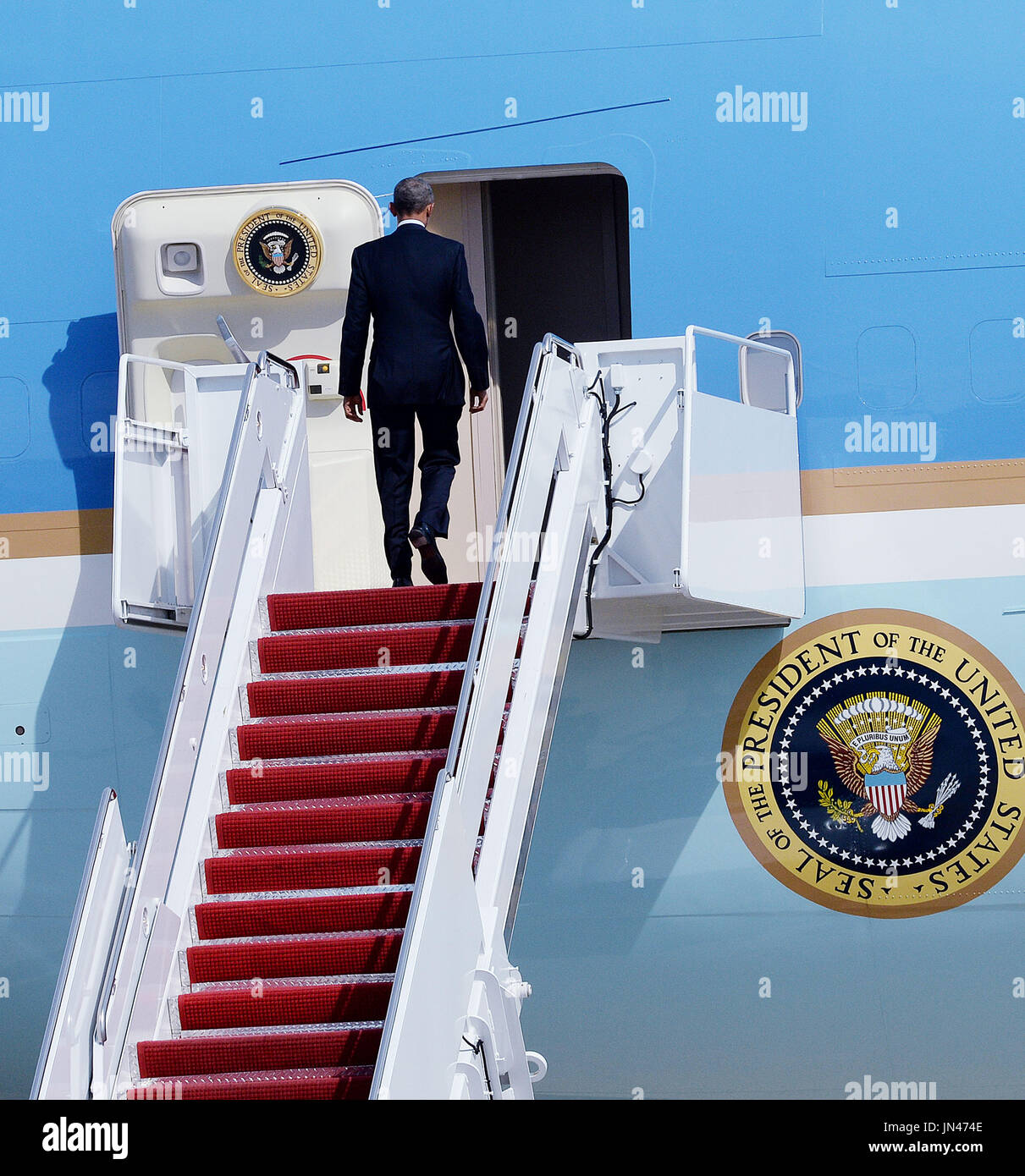 United States President Barack Obama boards Air Force One at Joint Base ...