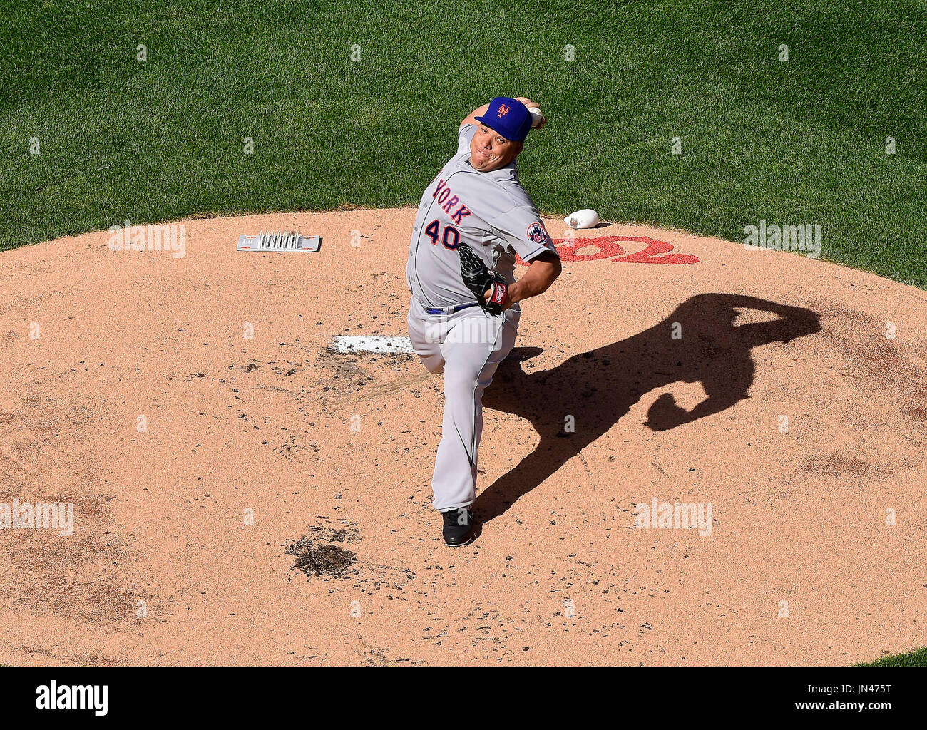 New York Mets pitcher Bartolo Colon (40) delivers his first pitch of ...