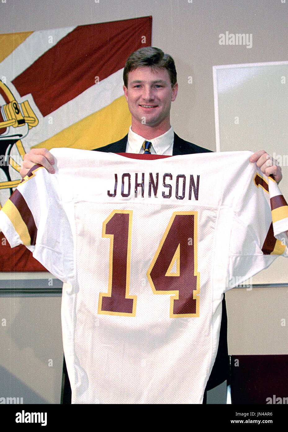 Newly acquired Washington Redskins quarterback Brad Johnson (14) holds ...