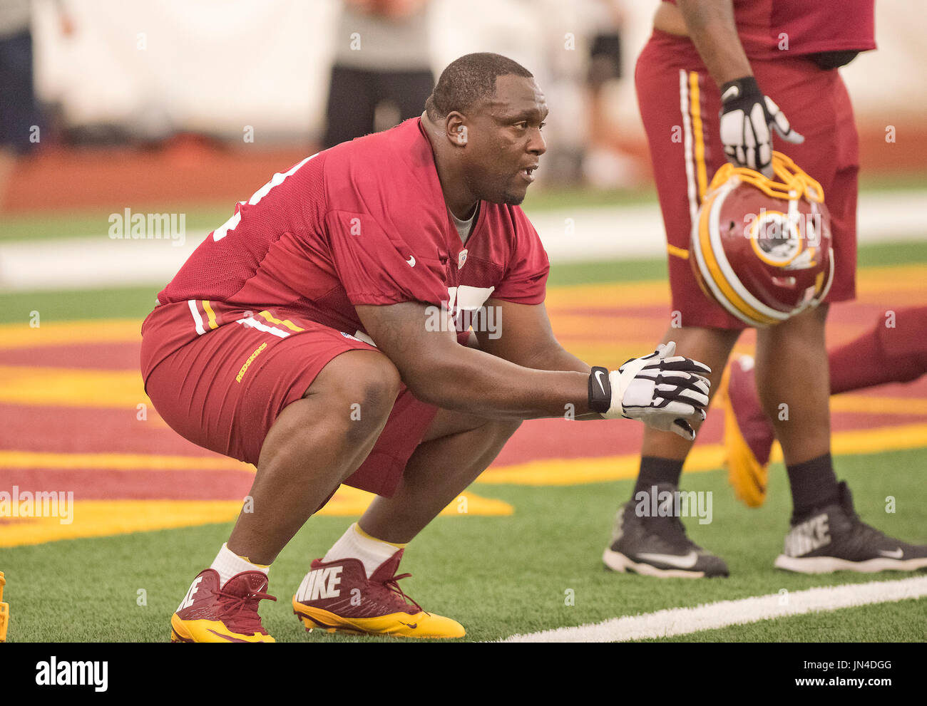 Washington Redskins nose tackle Jerrell Powe (72) participates in an ...