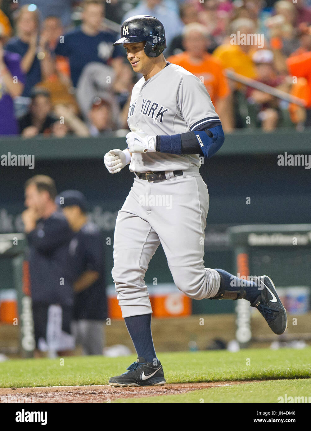 New York Yankees designated hitter Alex Rodriguez (13) smiles as he ...