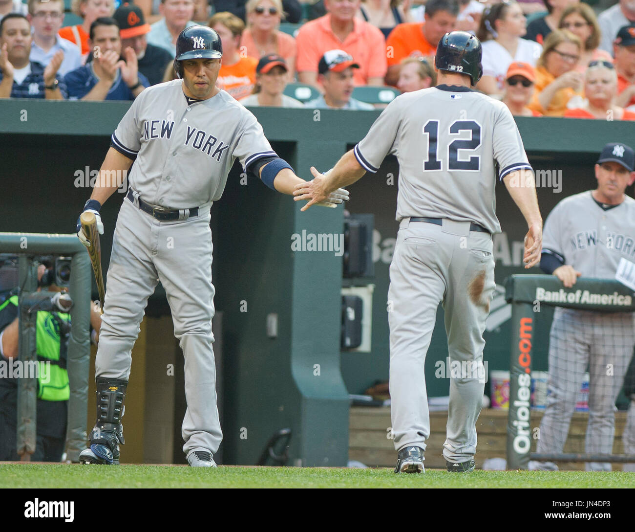 New York Yankees third baseman Chase Headley (12) is congratulated by ...