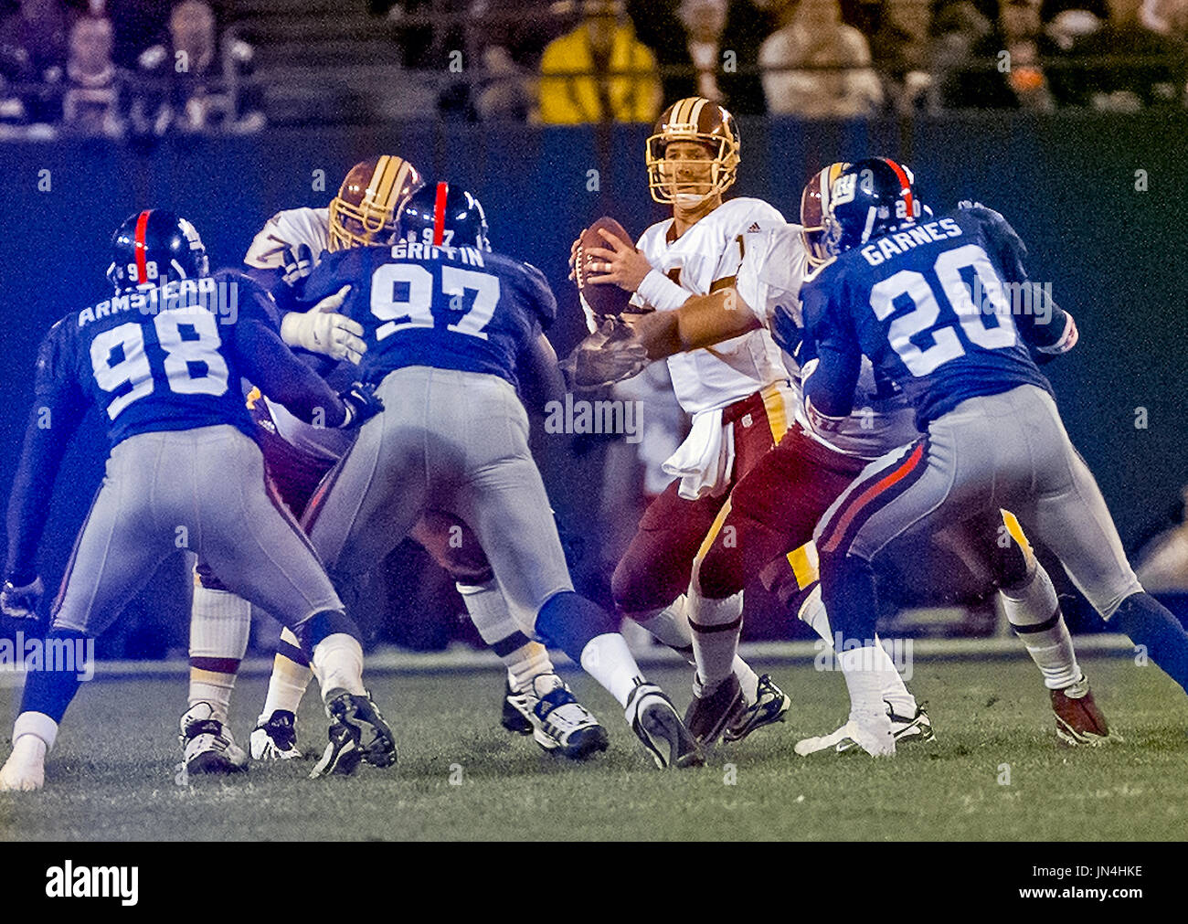 Washington Redskins quarterback Brad Johnson (14) looks for a receiver ...