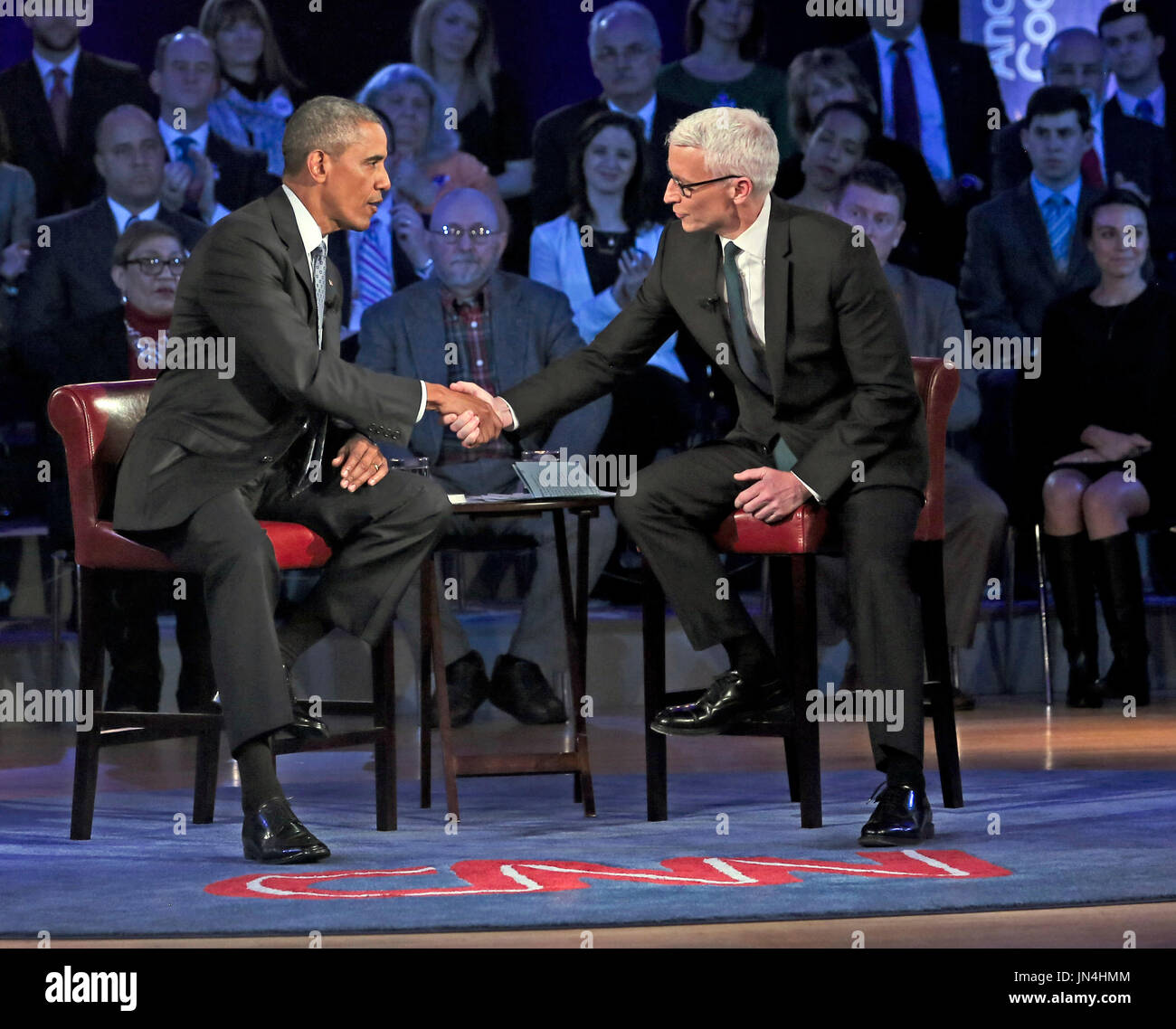 United States President Barack Obama shakes hands with CNN's Anderson ...