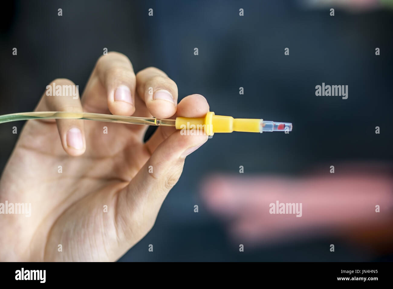 Syringe, medical injection, bottle, ampule in hand, palm or fingers ...