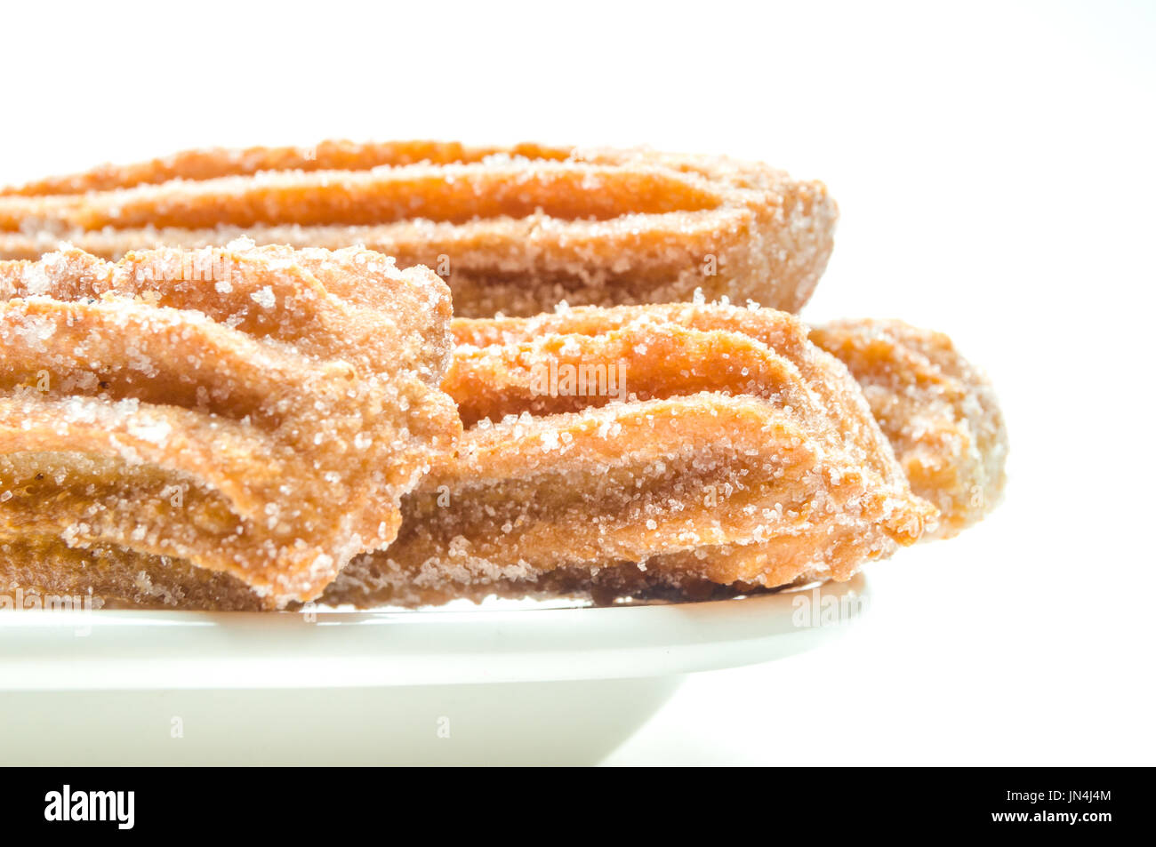 Churros isolated on white background Stock Photo - Alamy