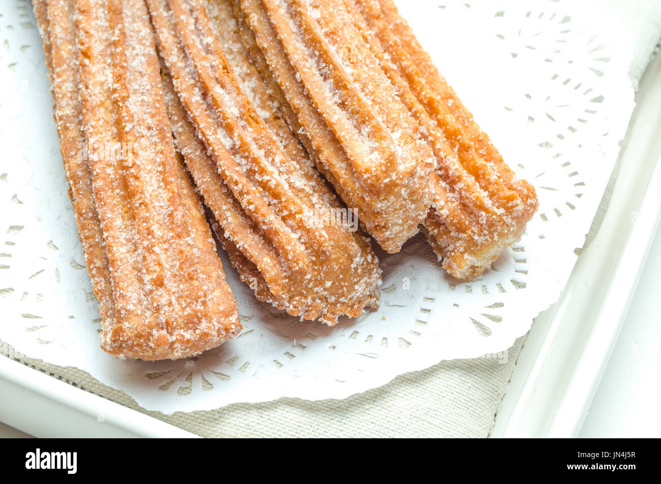 Churros isolated on white background Stock Photo - Alamy