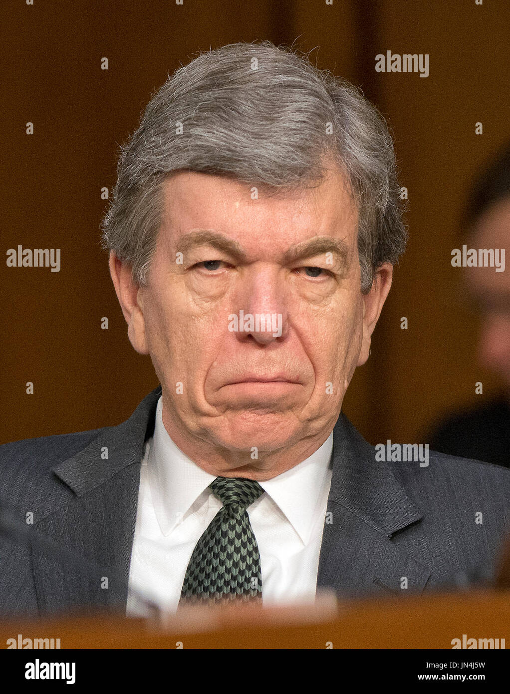 United States Senator Roy Blunt (Republican of Missouri) listens as ...