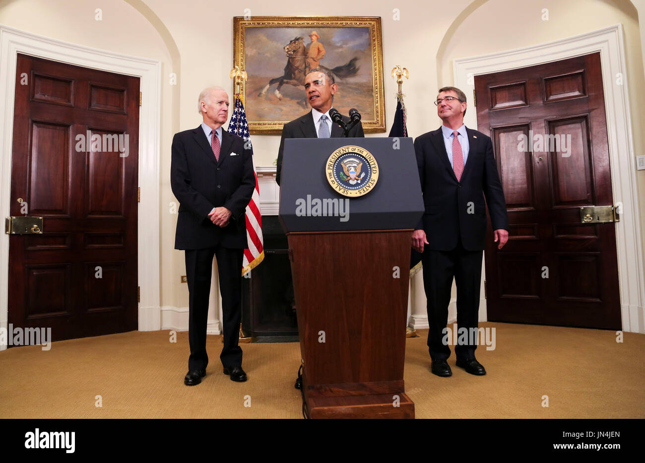 United States President Barack Obama, center, delivers a statement on ...