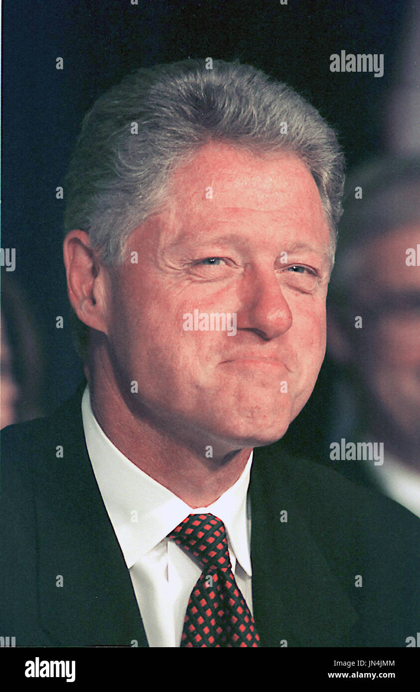 United States President Bill Clinton smiles as he delivers his remarks ...