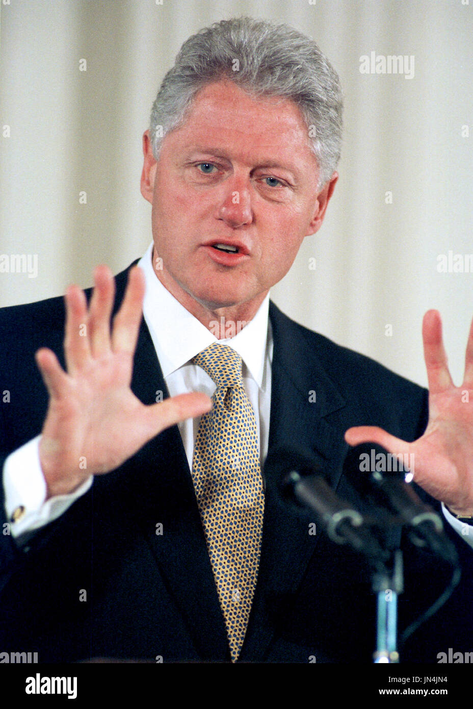 United States President Bill Clinton makes opening remarks at the ...