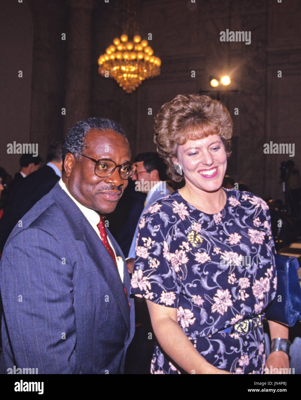 Judge Clarence Thomas, left, and his wife, Virginia, right, arrive for ...